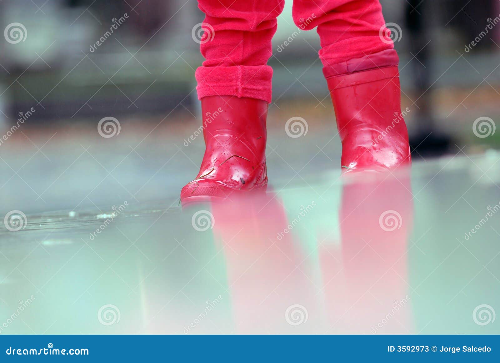 Little Red Boots in the Rain Stock Image - Image of shoe, contrast: 3592973
