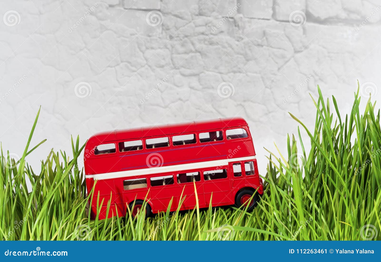 Little Red Decorative Bus on the Grass Stock Image - Image of ...