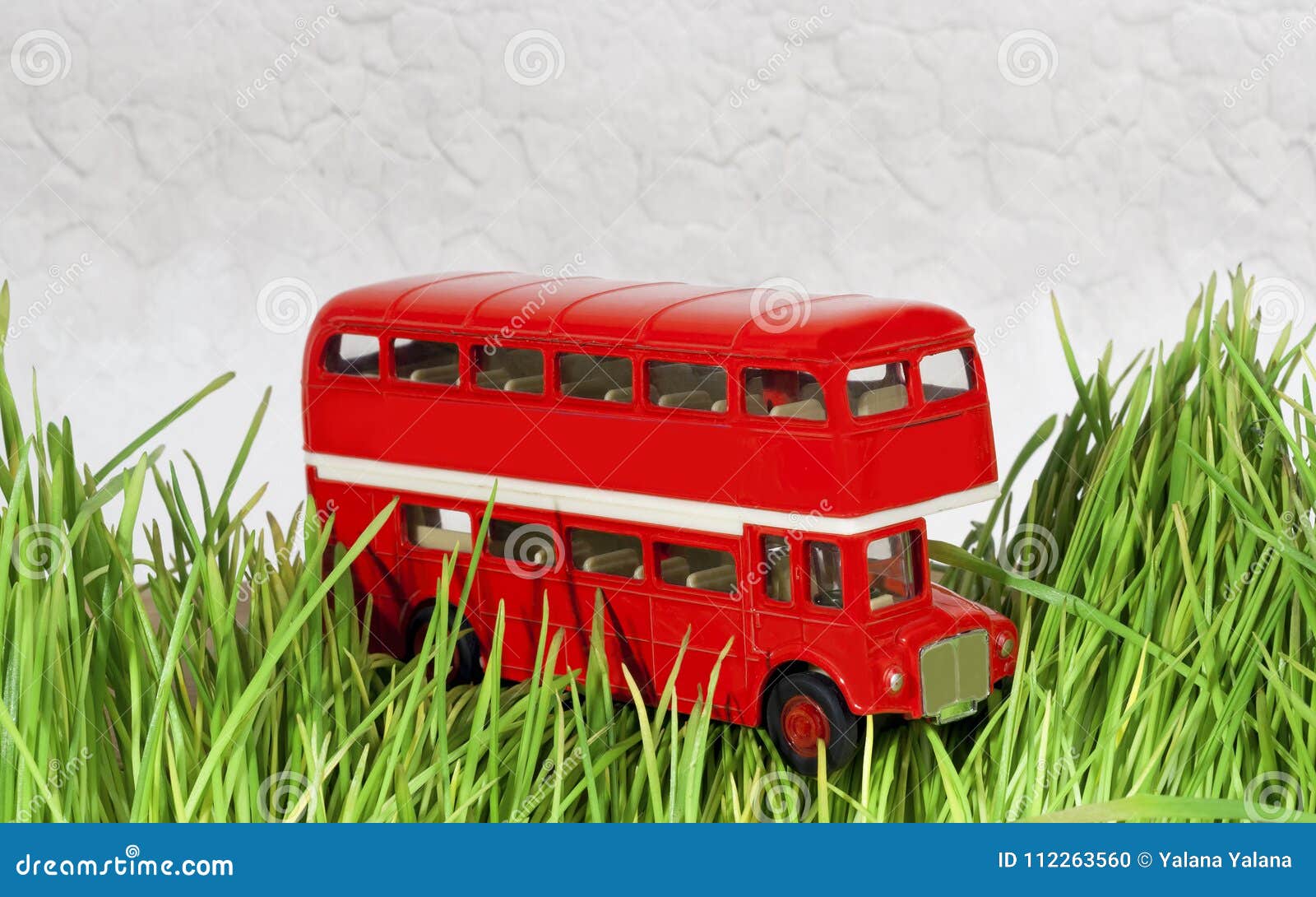 Little Red Decorative Bus on the Grass Stock Photo - Image of green ...