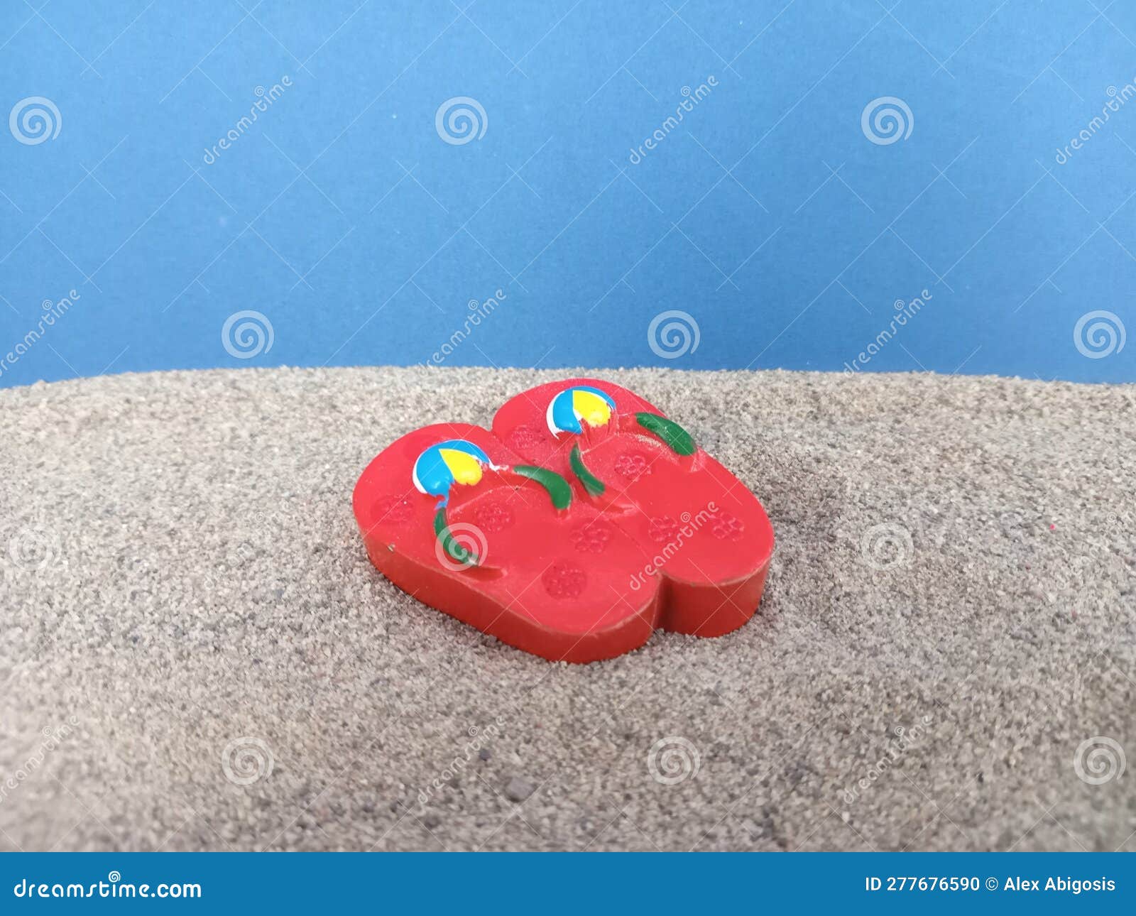Little Red Flip Flops on Beach Sand Stock Photo - Image of clothing ...