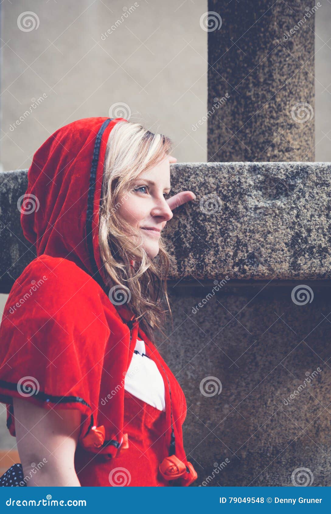 Little Red Riding Hood in Front of a Wall Stock Photo - Image of fairy ...