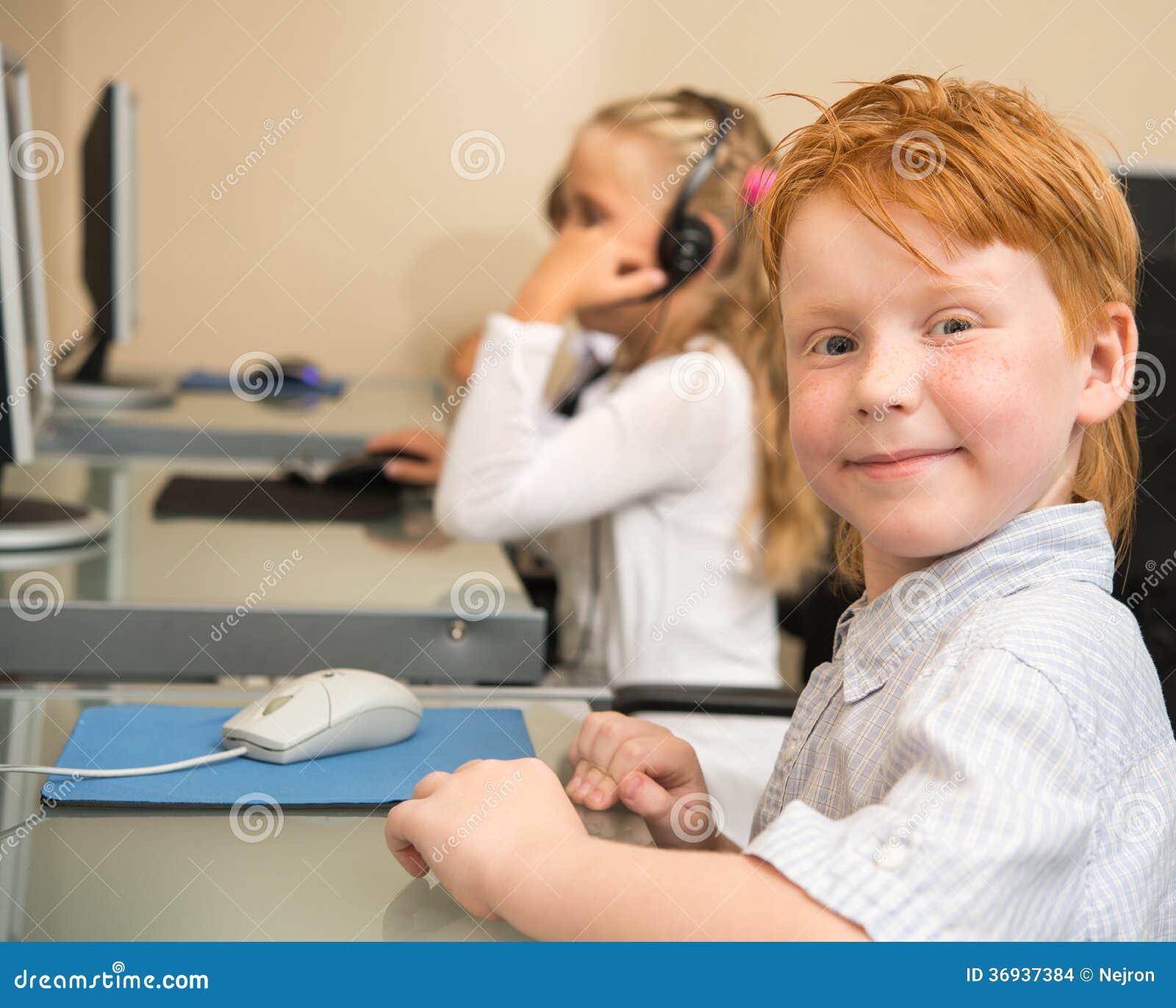 Little Redhead Schoolboy in Front of Desktop Computer Stock Photo ...