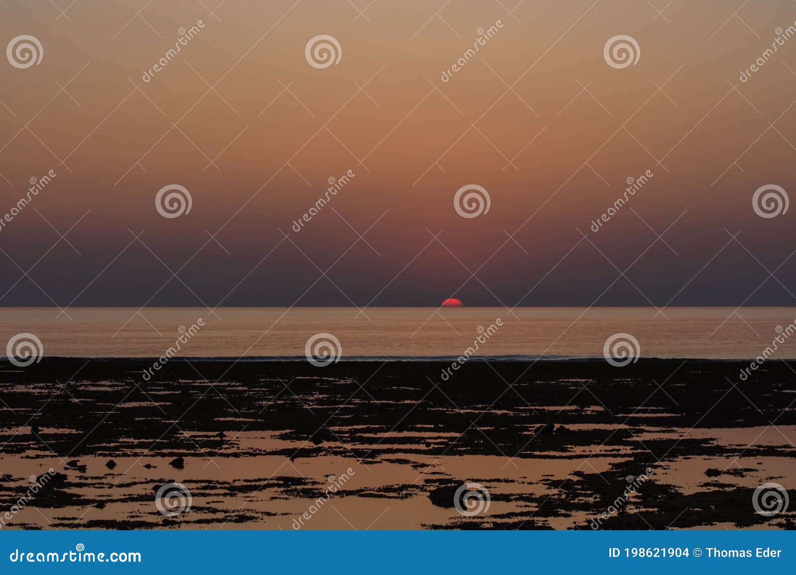 Little Rising Red Sun at the Sea Stock Photo - Image of beauty, blue ...