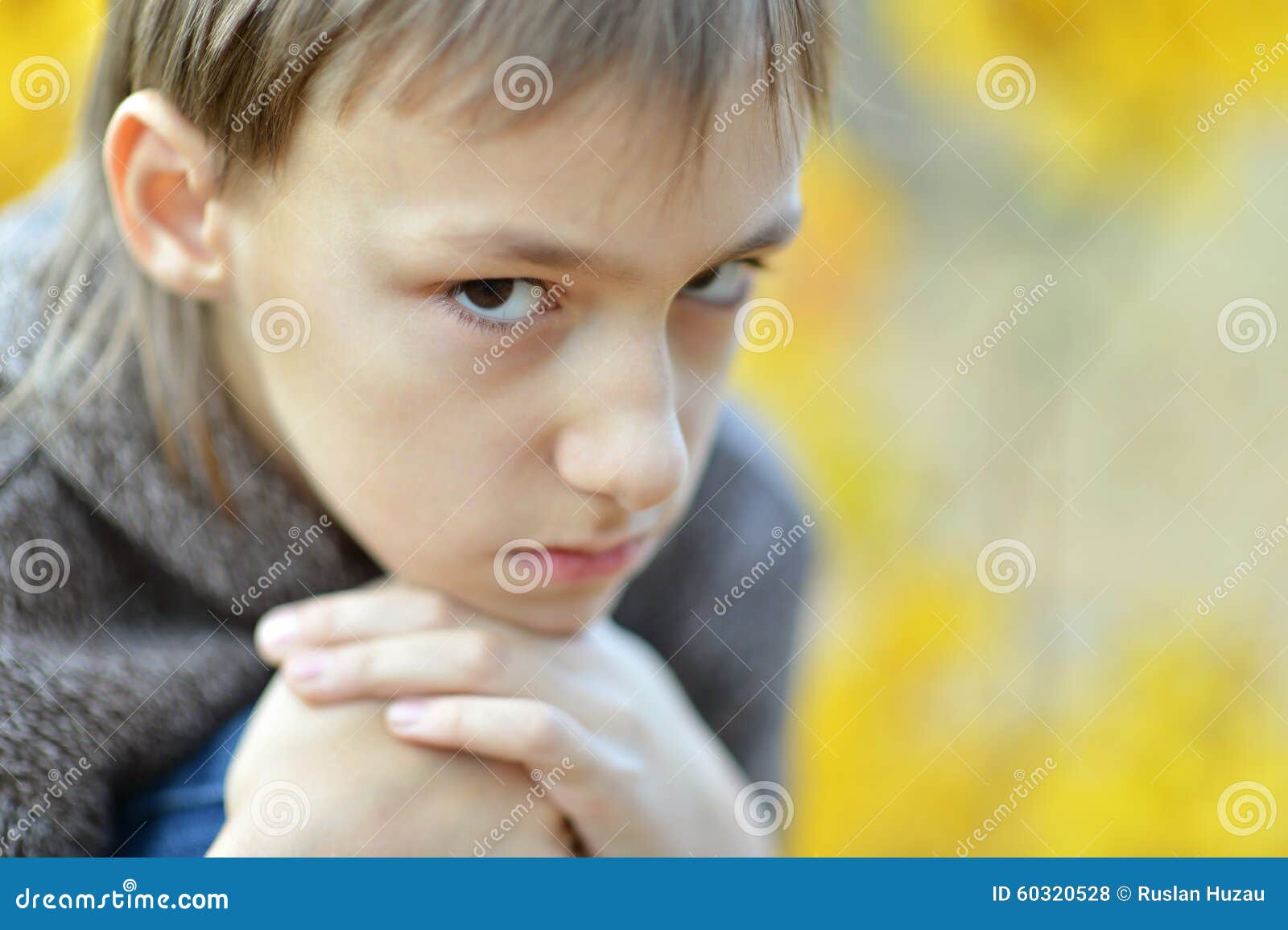 Little sad boy in park stock photo. Image of entertainment - 60320528