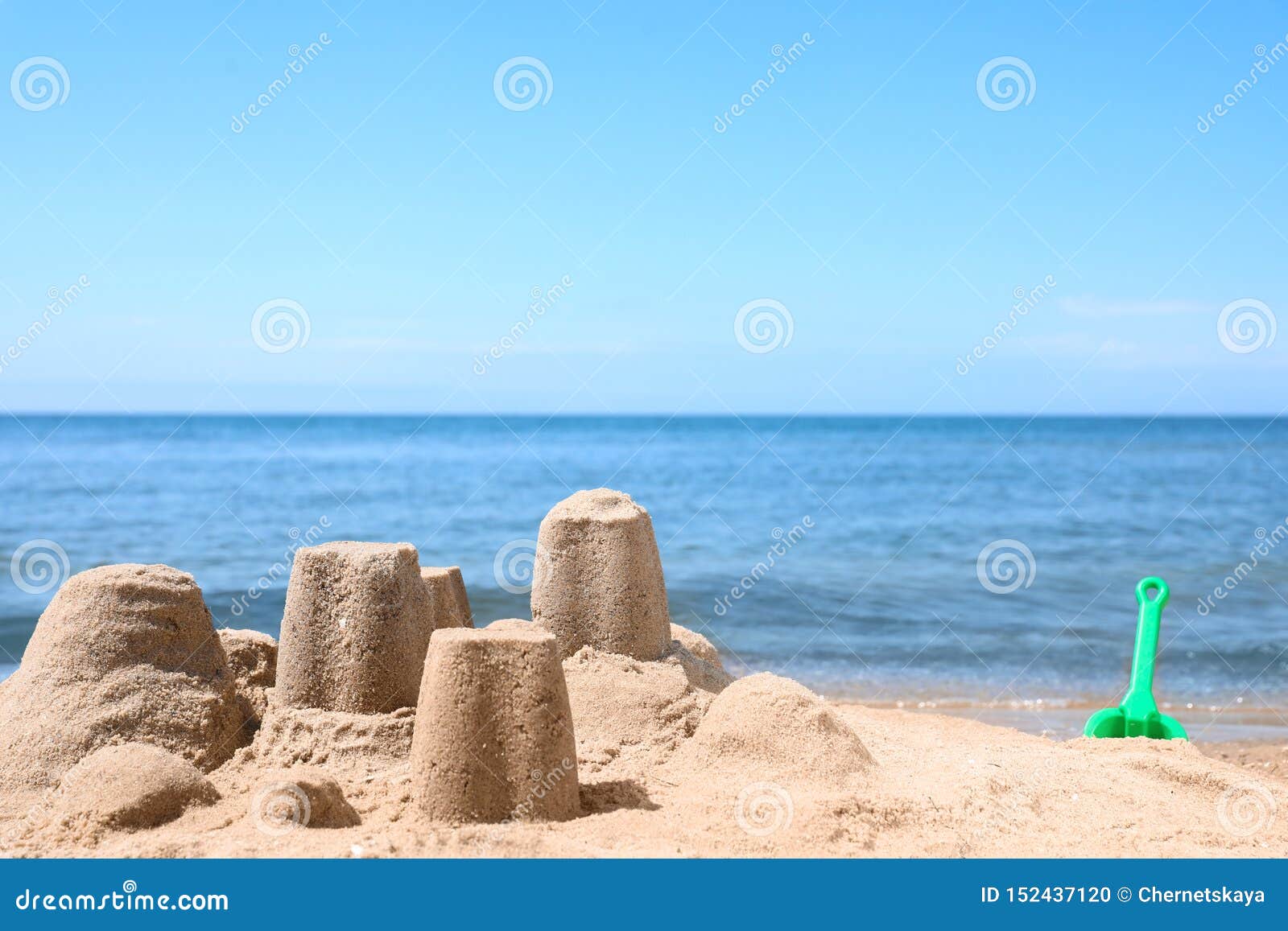 Little Sand Figures on Beach Near Sea Stock Photo - Image of leisure ...