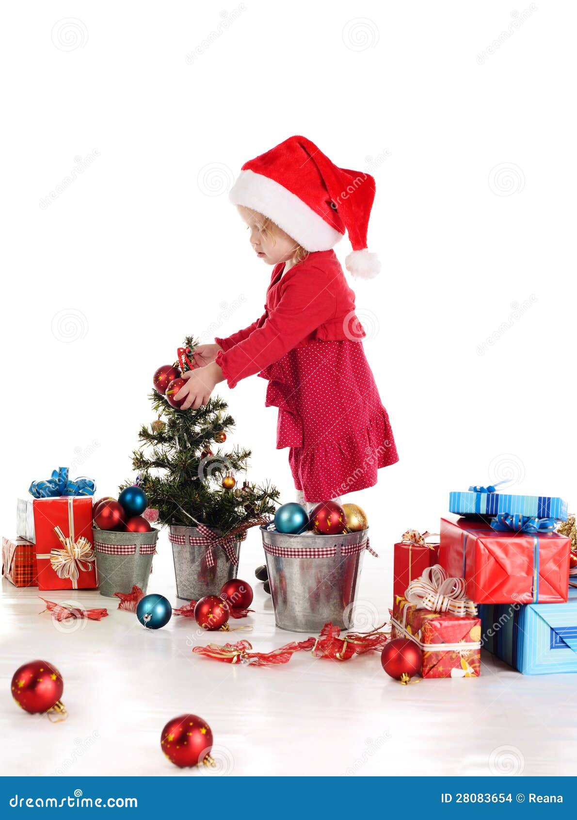 Little Santa Helper Decorating a Tree Stock Photo - Image of child ...