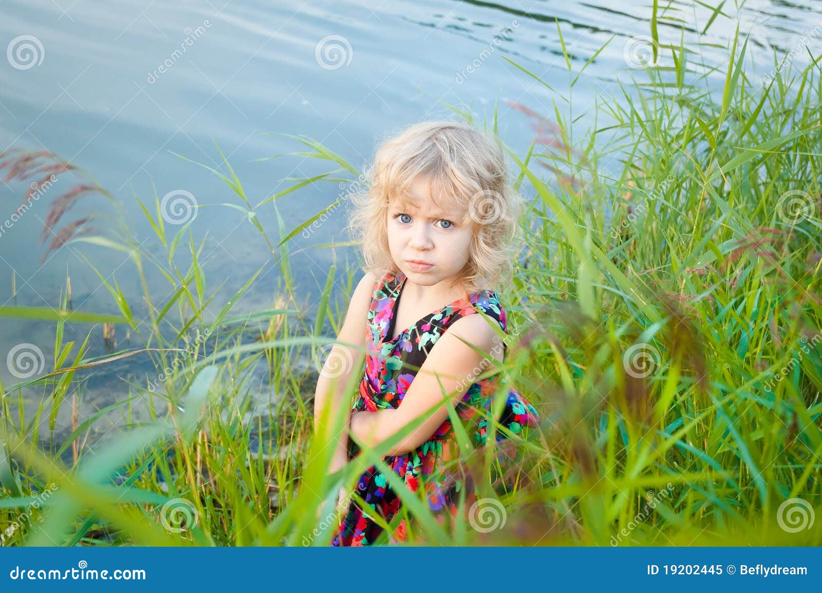 Little Scared Girl Walking Alone at Riverside Stock Image - Image of ...