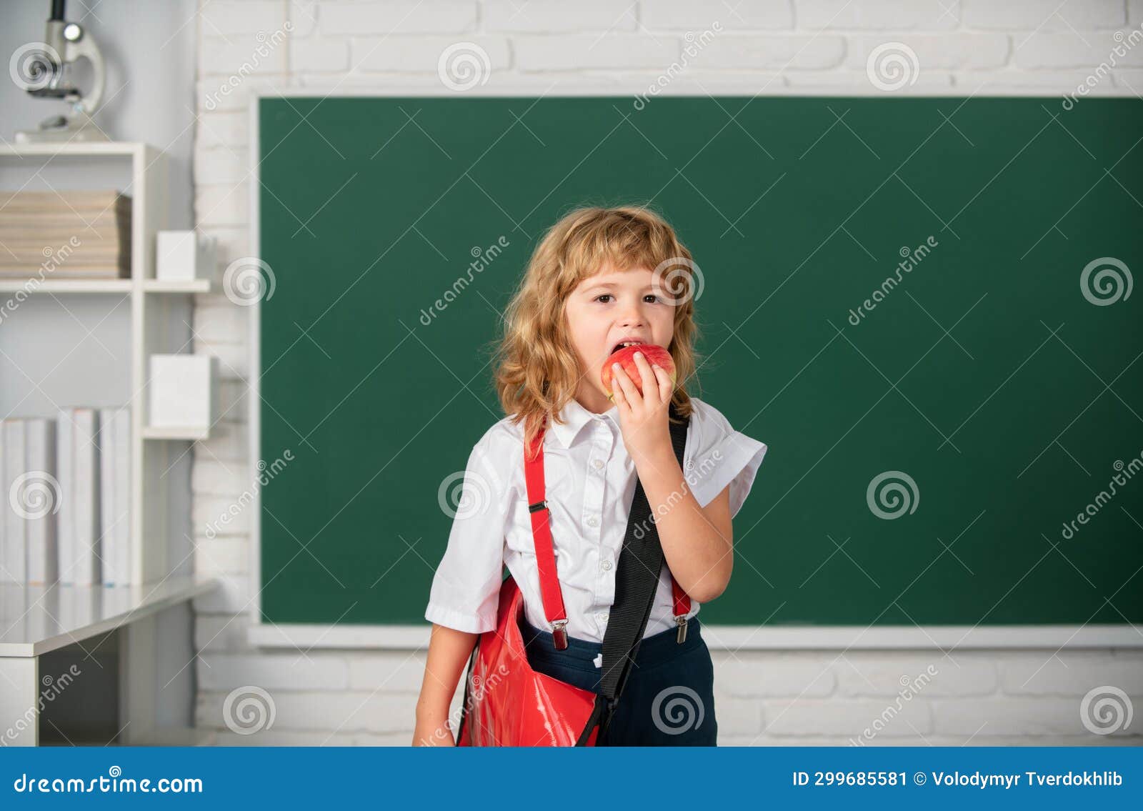 Little School Boy Student Eating Apple Learning in Class, Study English ...