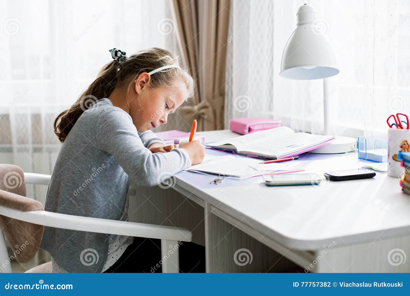 Little School Girl Doing Homework Stock Photo - Image of serious ...