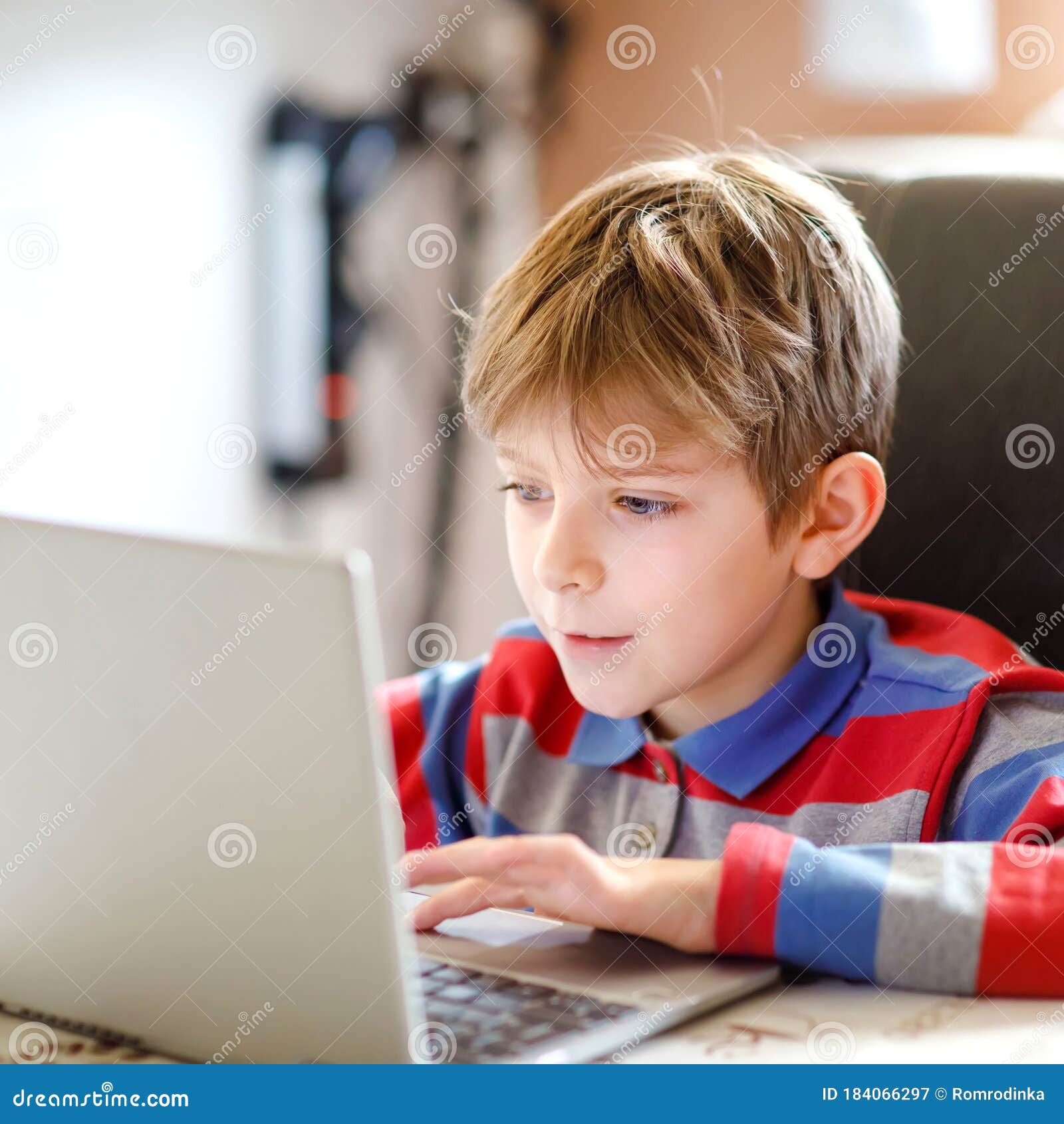 Little School Kid Making School Homework on Computer. Child Learning on ...