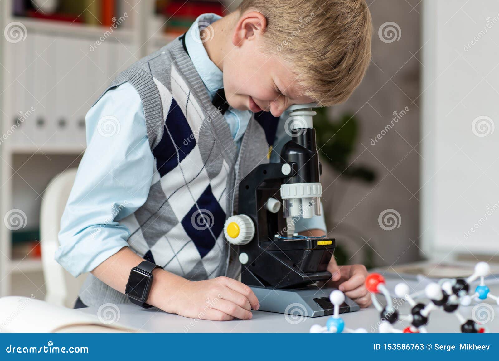 Little Schoolboy in Casual Clothes Looks in Microscope Stock Image ...