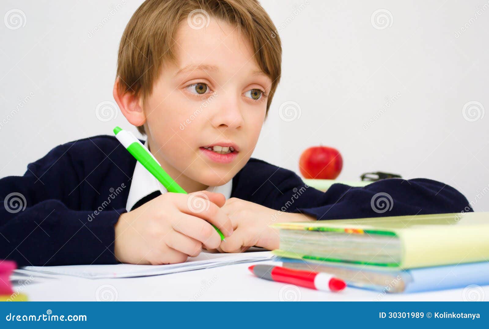Schoolboy Writing Homework from School in Workbook Stock Image - Image ...