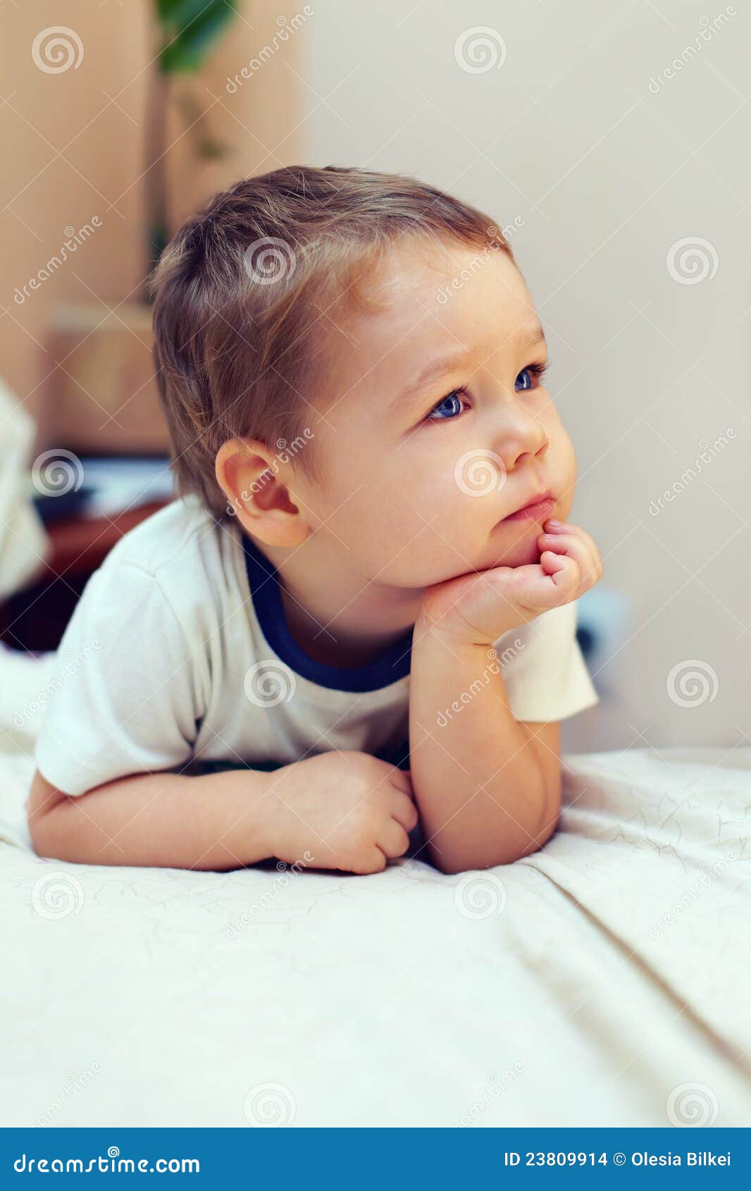 Little Serious Boy Keeping His Hands on the Chin Stock Photo - Image of ...