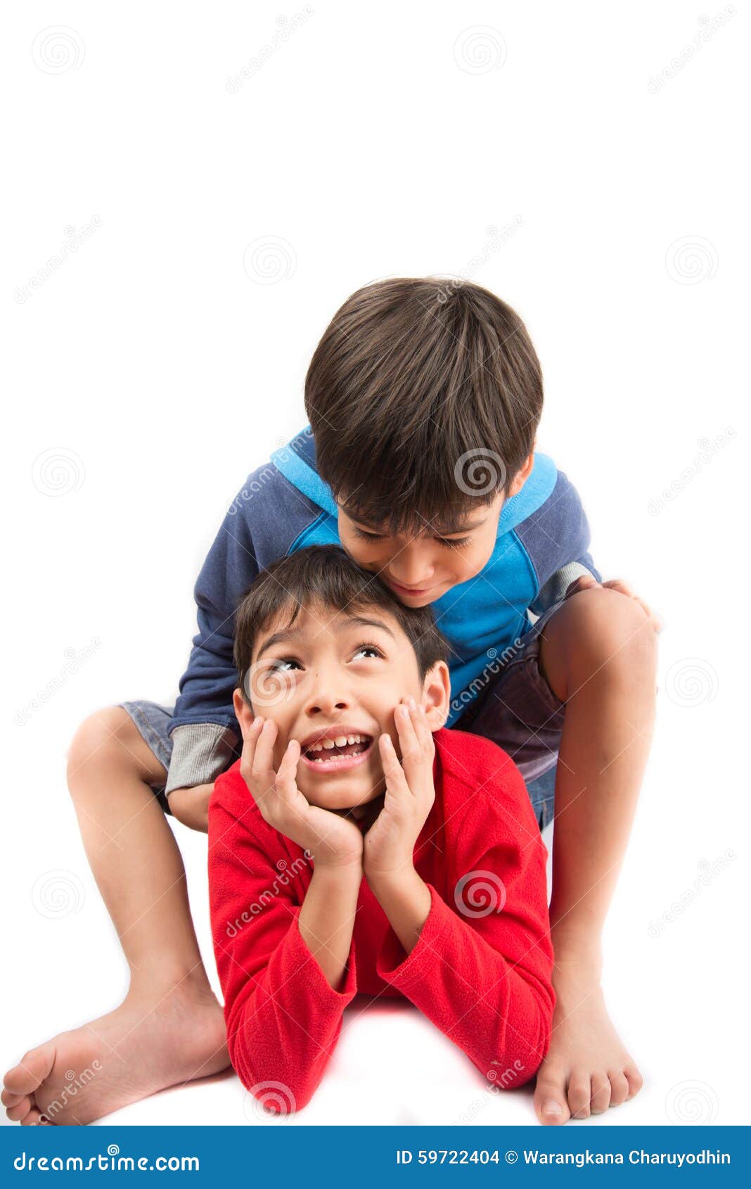 Little Sibling Boys Sit and Play Together on White Background Stock ...