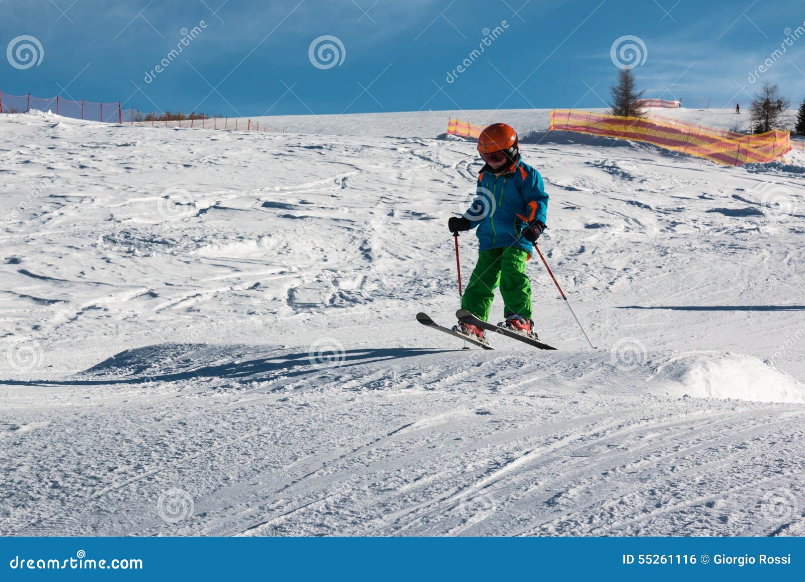 Little Skier Performs Jump in the Snow Stock Photo - Image of alpine ...
