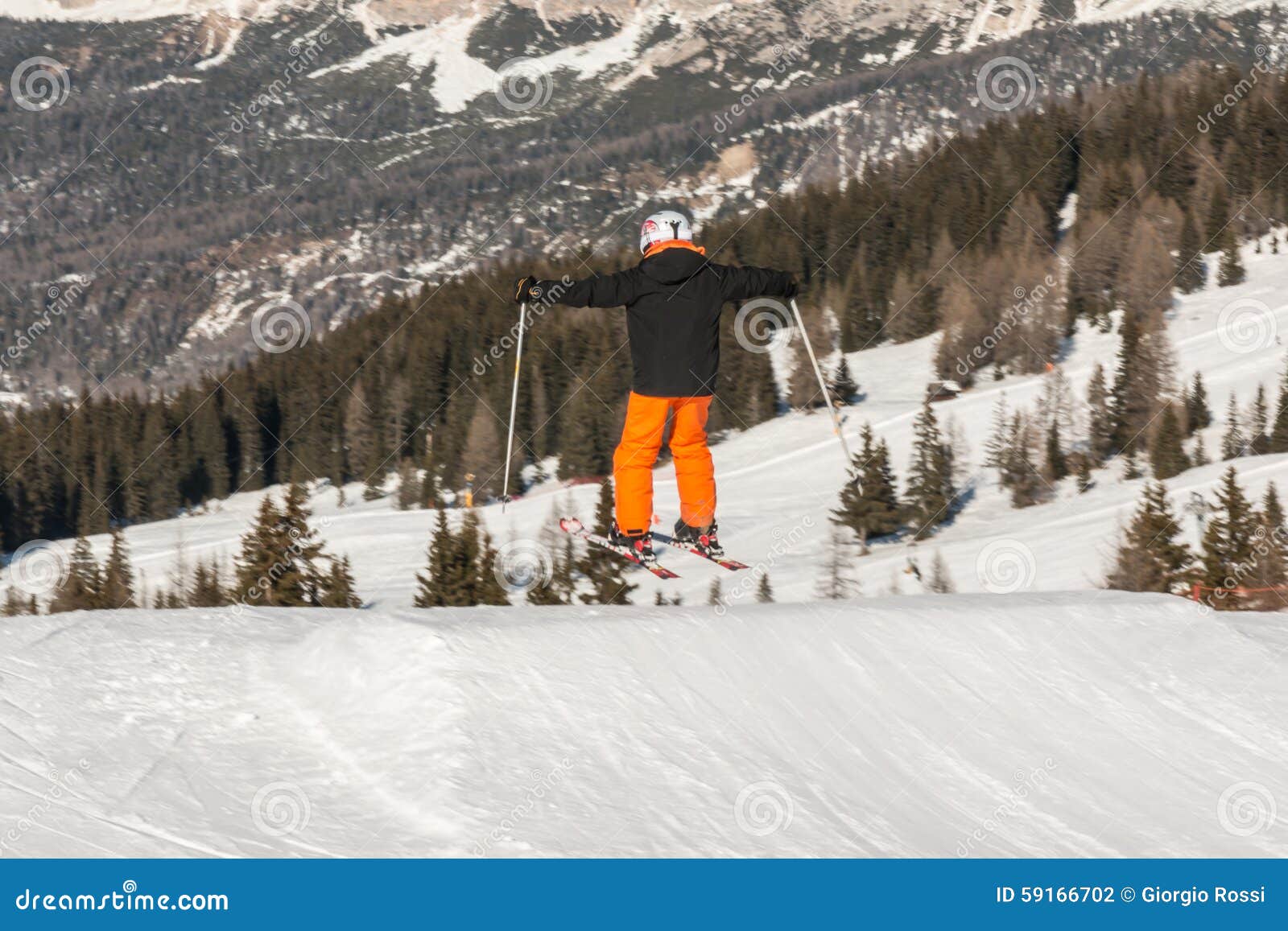 Little Skier Performs Jump in the Snow Stock Photo - Image of alpine ...
