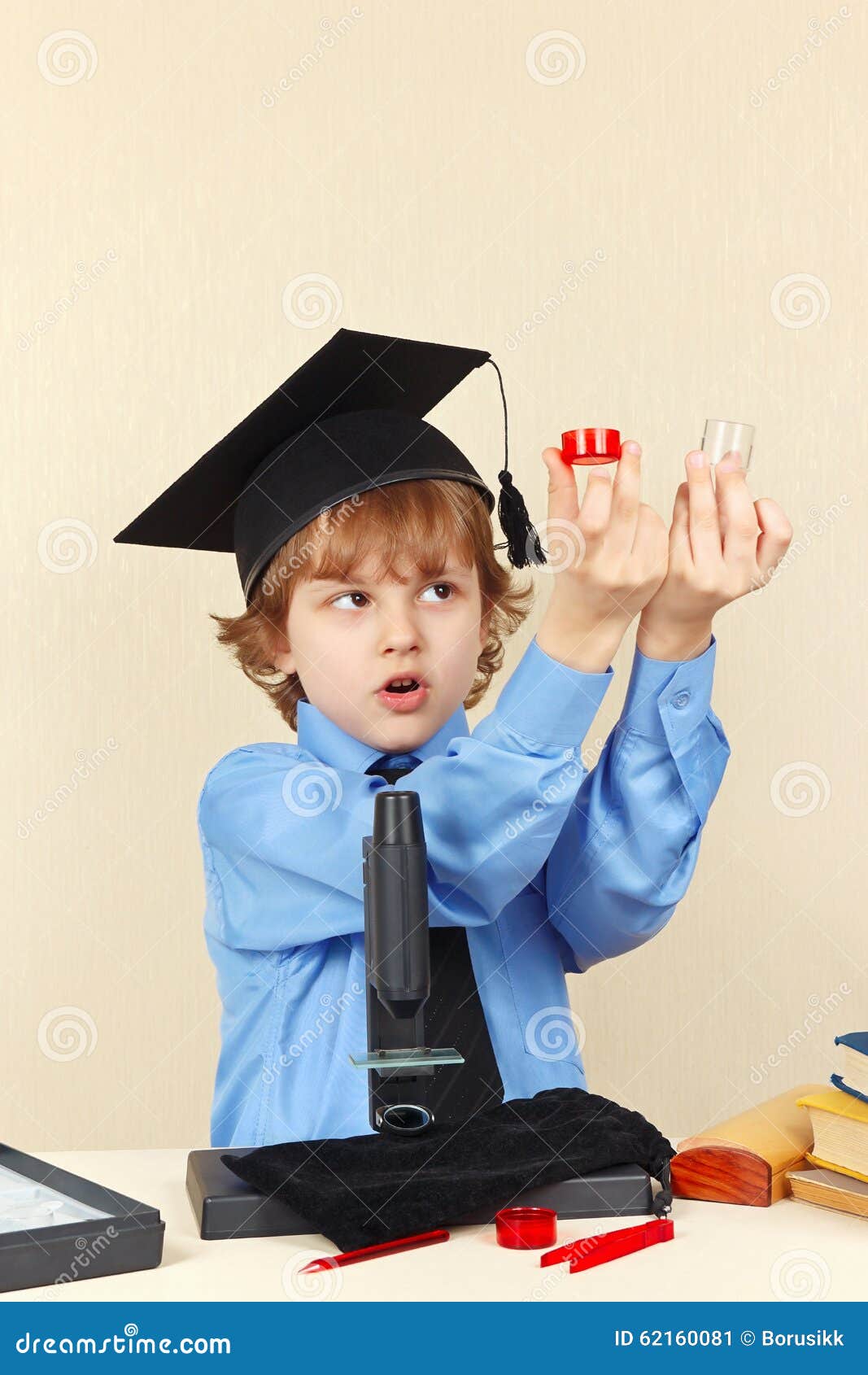 Little Smart Boy in Academic Hat Conducts Research with Microscope ...