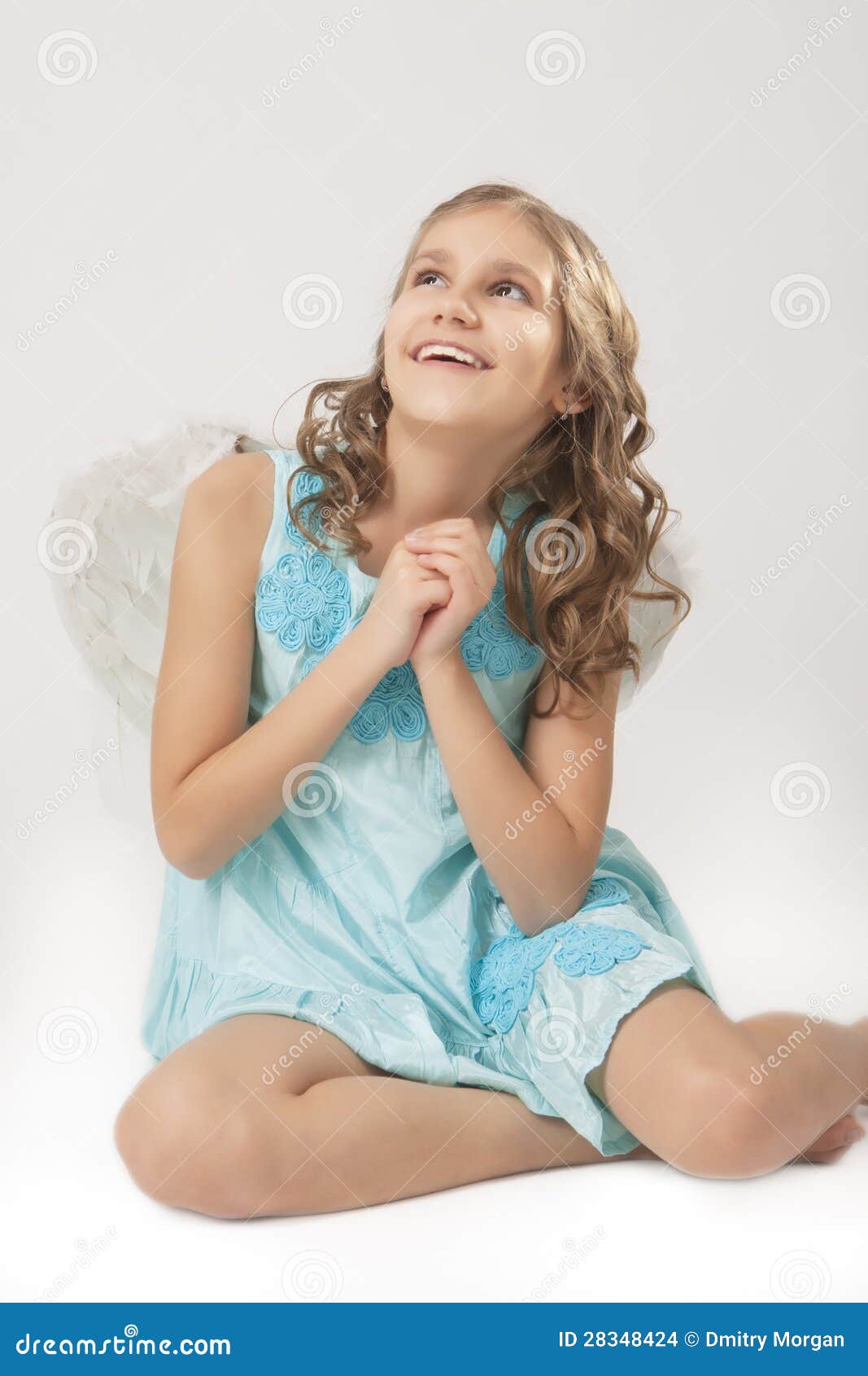Little smiling angel stock photo. Image of angelic, purity - 28348424
