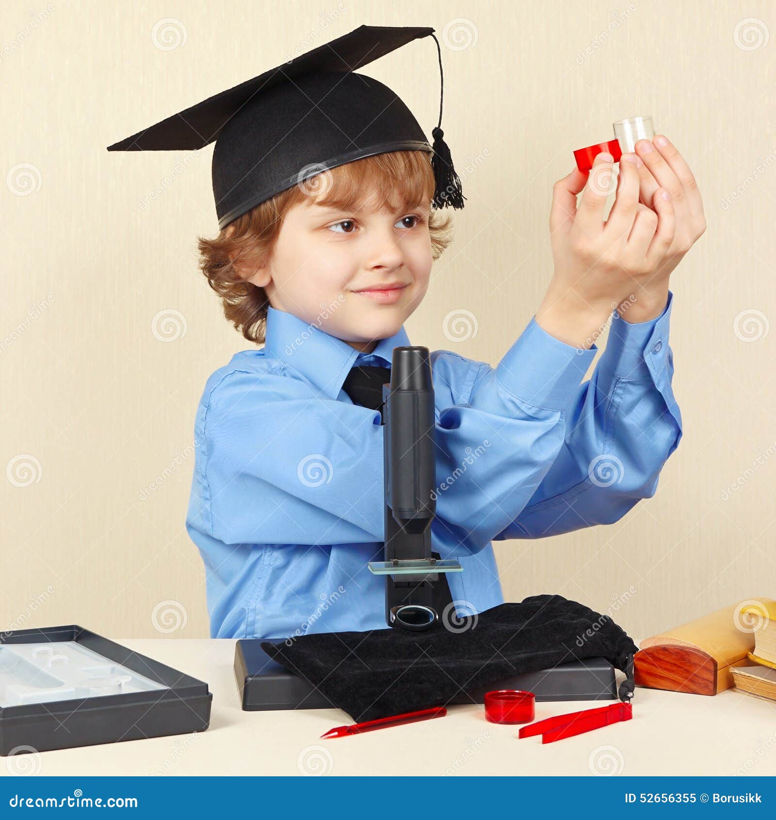 Little Smiling Boy in Academic Hat Conducts Scientific Research with ...