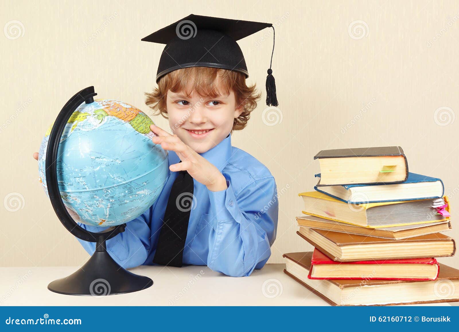 Little Smiling Boy in Academic Hat with Geographical Globe Stock Photo ...