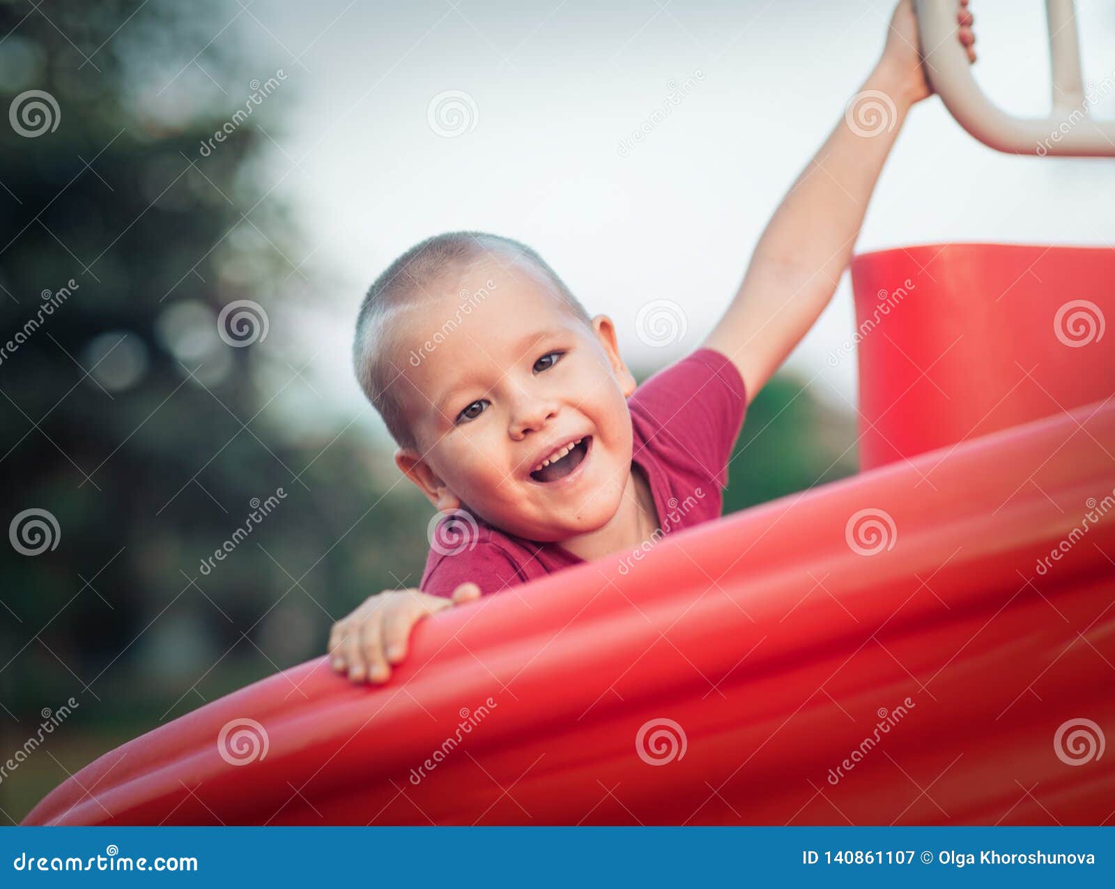 Little Smiling Boy on a Slide Stock Image - Image of little, happy ...