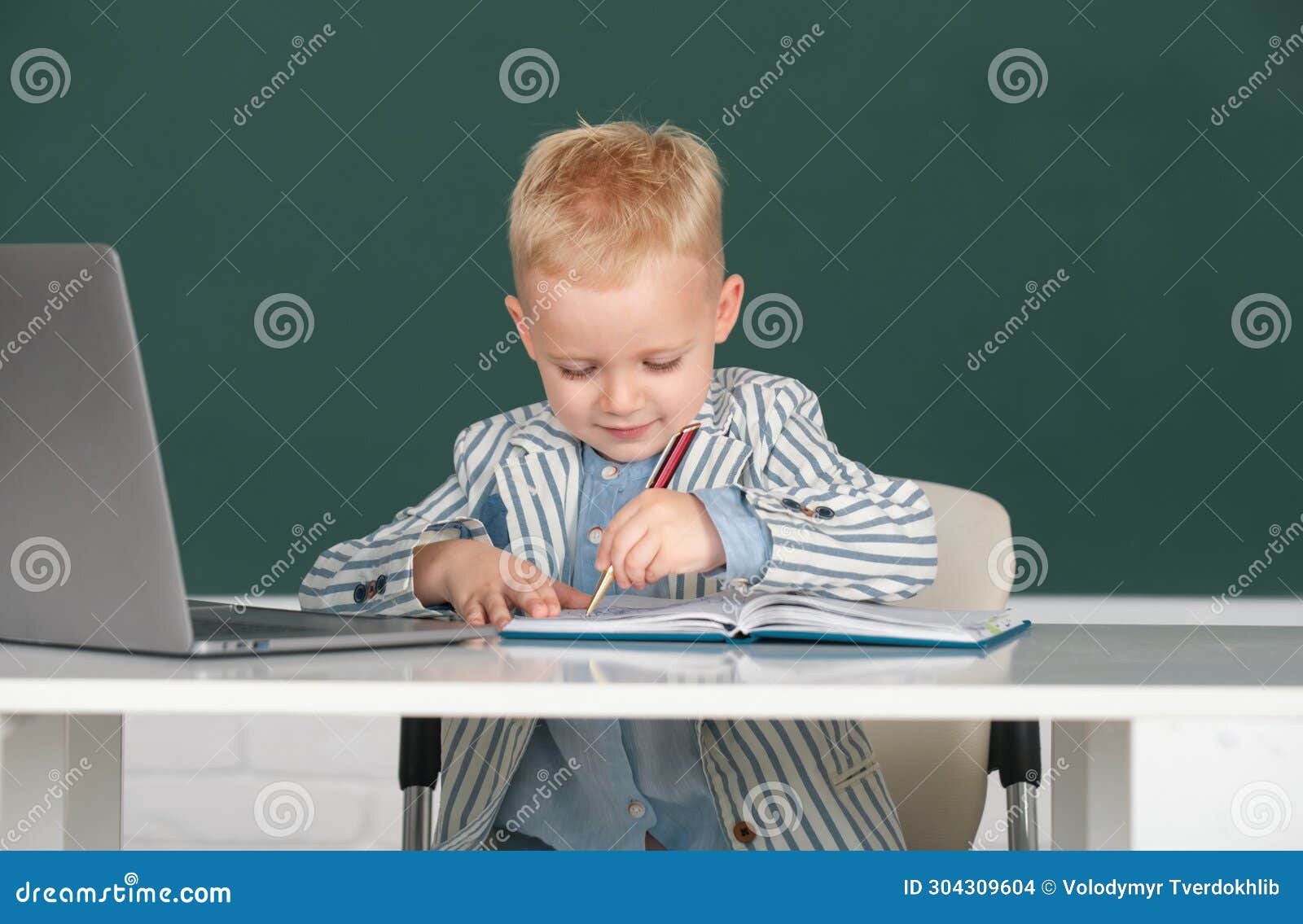 Little Student Child Studying in Classroom at Elementary School. Kid ...