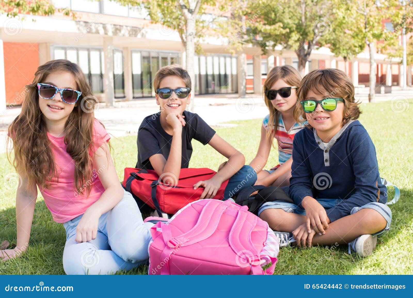 Little Students at School Campus Stock Photo - Image of park, group ...