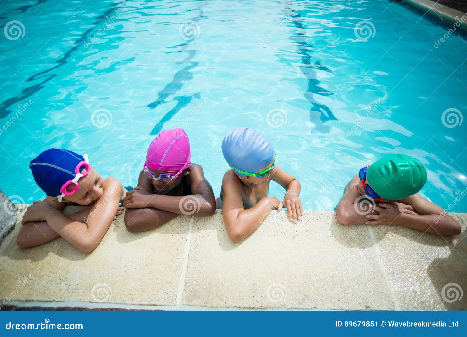 Little Swimmers Talking while Leaning at Poolside Stock Image - Image ...