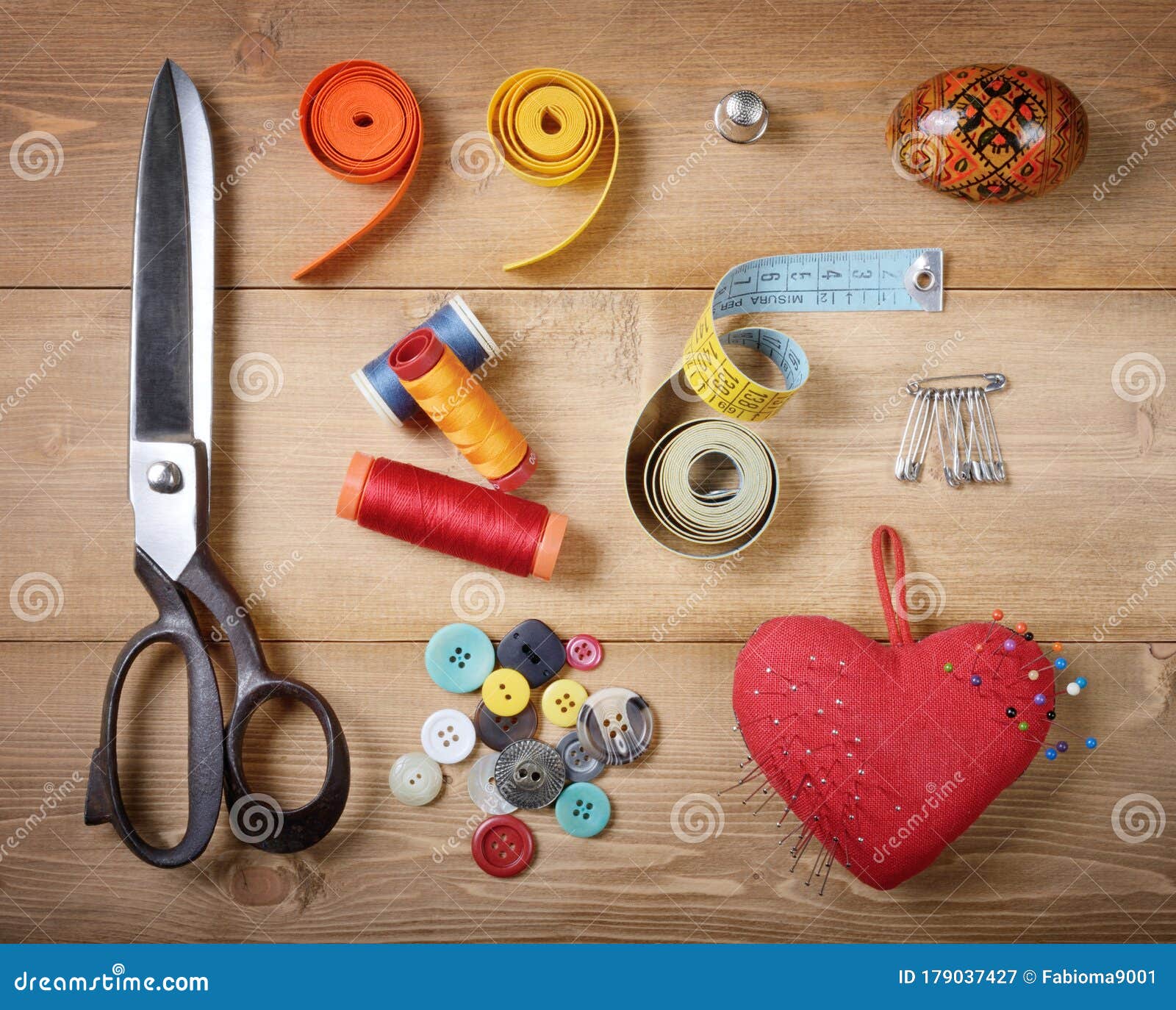 Tools and Objects for Tailoring on the Wooden Tailor`s Desk. Top View ...