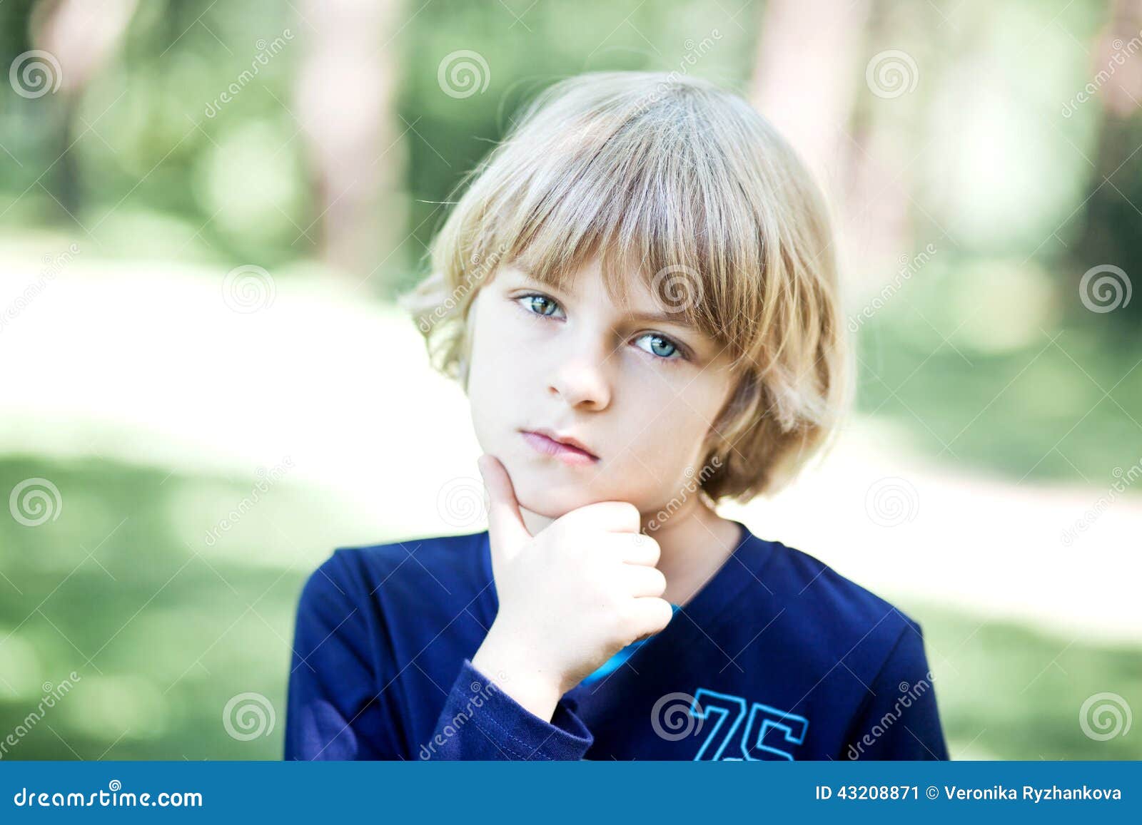 Little Boy Thinking About Somthing And Looking Up, Confused About An ...