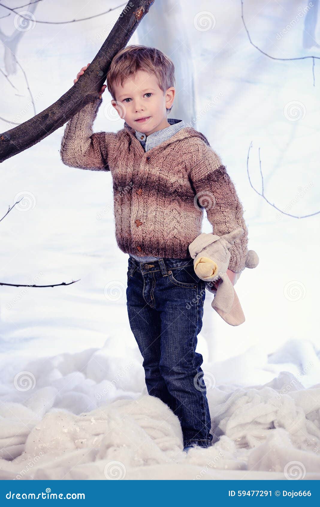 Little Toddler Boy in Studio with Snow and Forest Background Stock ...