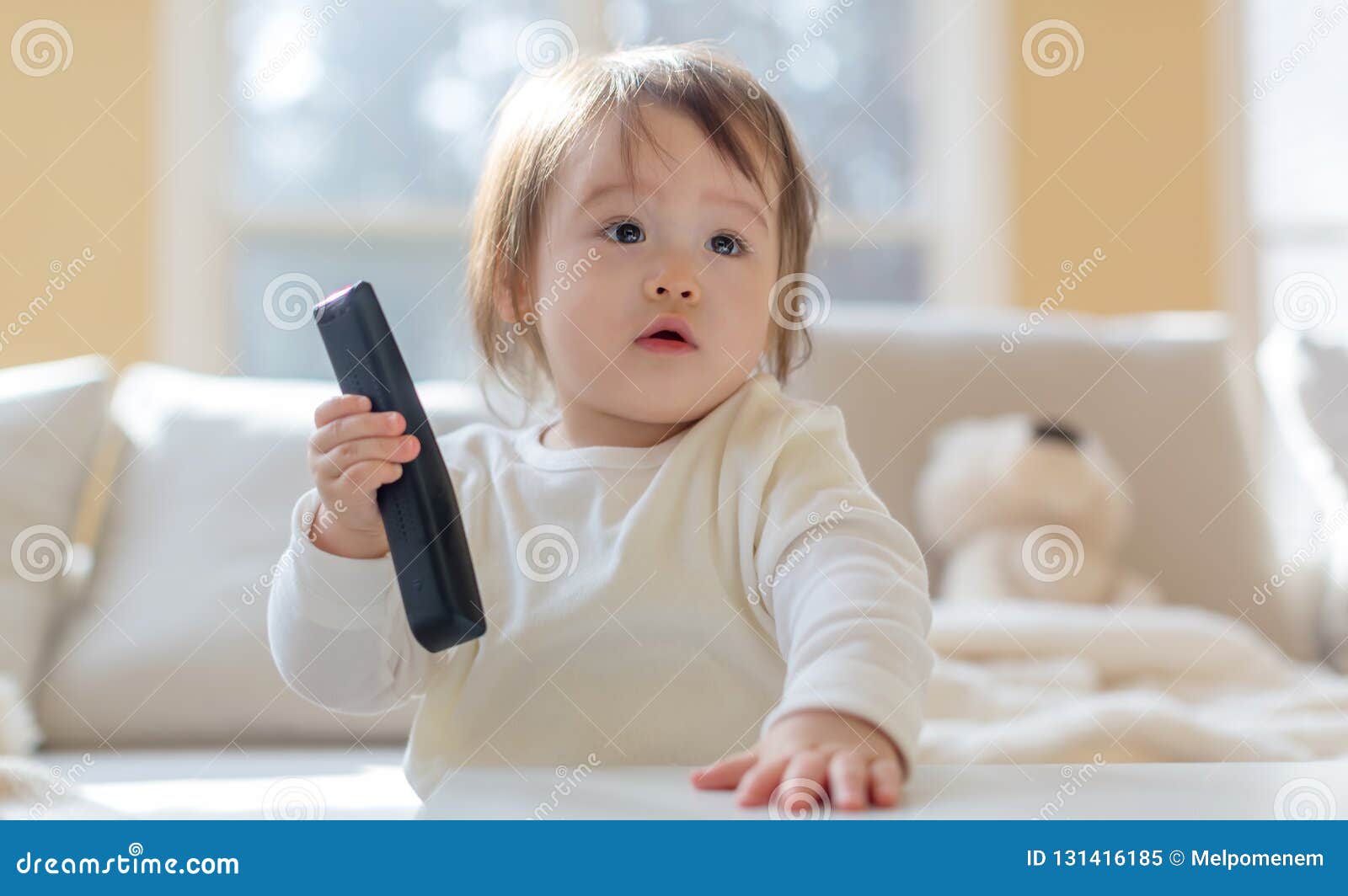 Toddler Boy with a TV Remote Control Stock Image - Image of multiracial ...