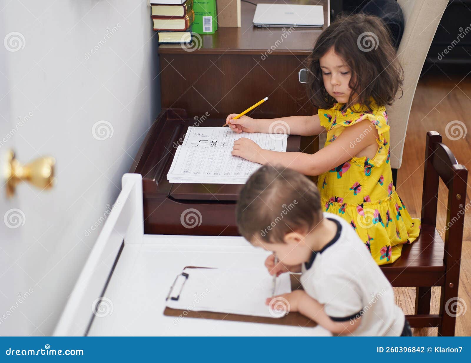 Little Boy Copying His Sister Doing Her Homework Stock Photo - Image of ... Little Boy Copying His Sister Doing Her Homework Stock Photo - Image of ...