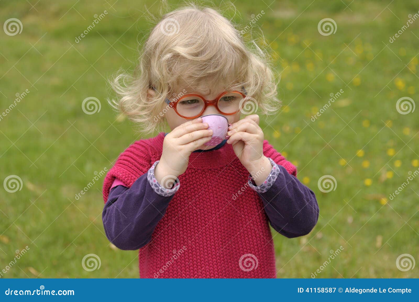 Little Toddler Playing Tea Time Outdoors in the Garden Stock Image ...