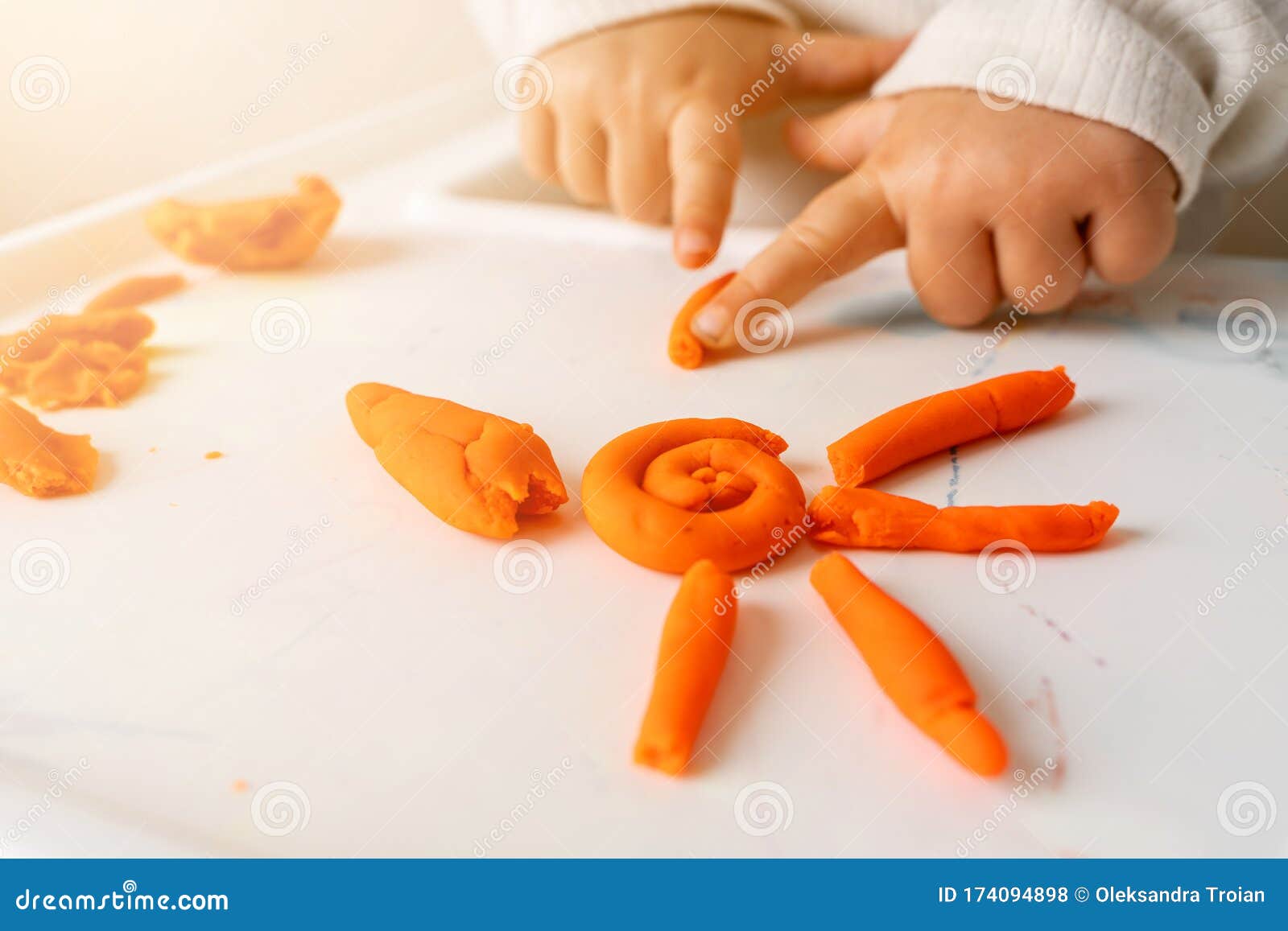 Little Toddler Plays Play Dough. Modeling Orange Sun Stock Photo ...