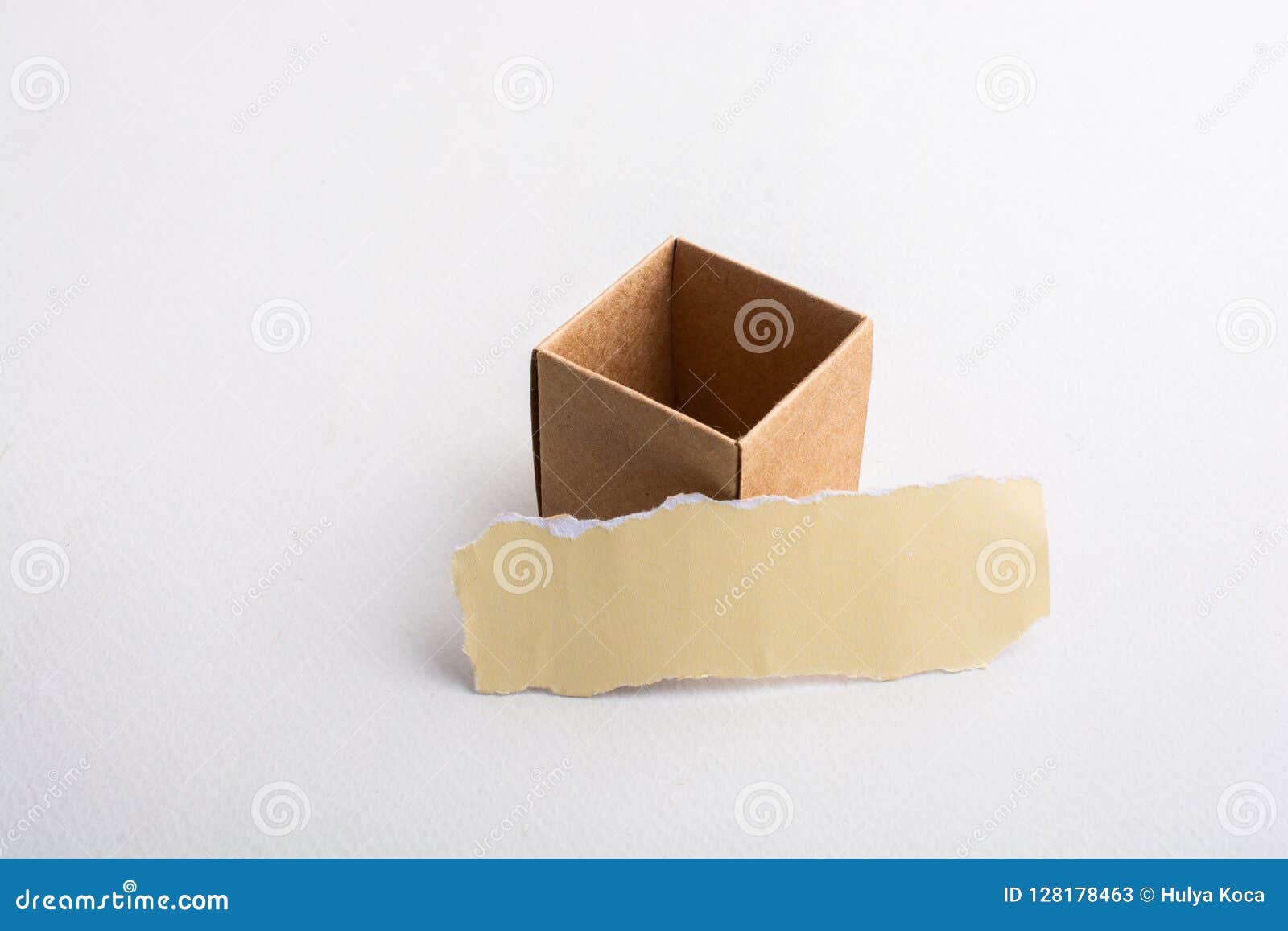Little Torn Paper beside an Empty Box Stock Image - Image of ripped ...