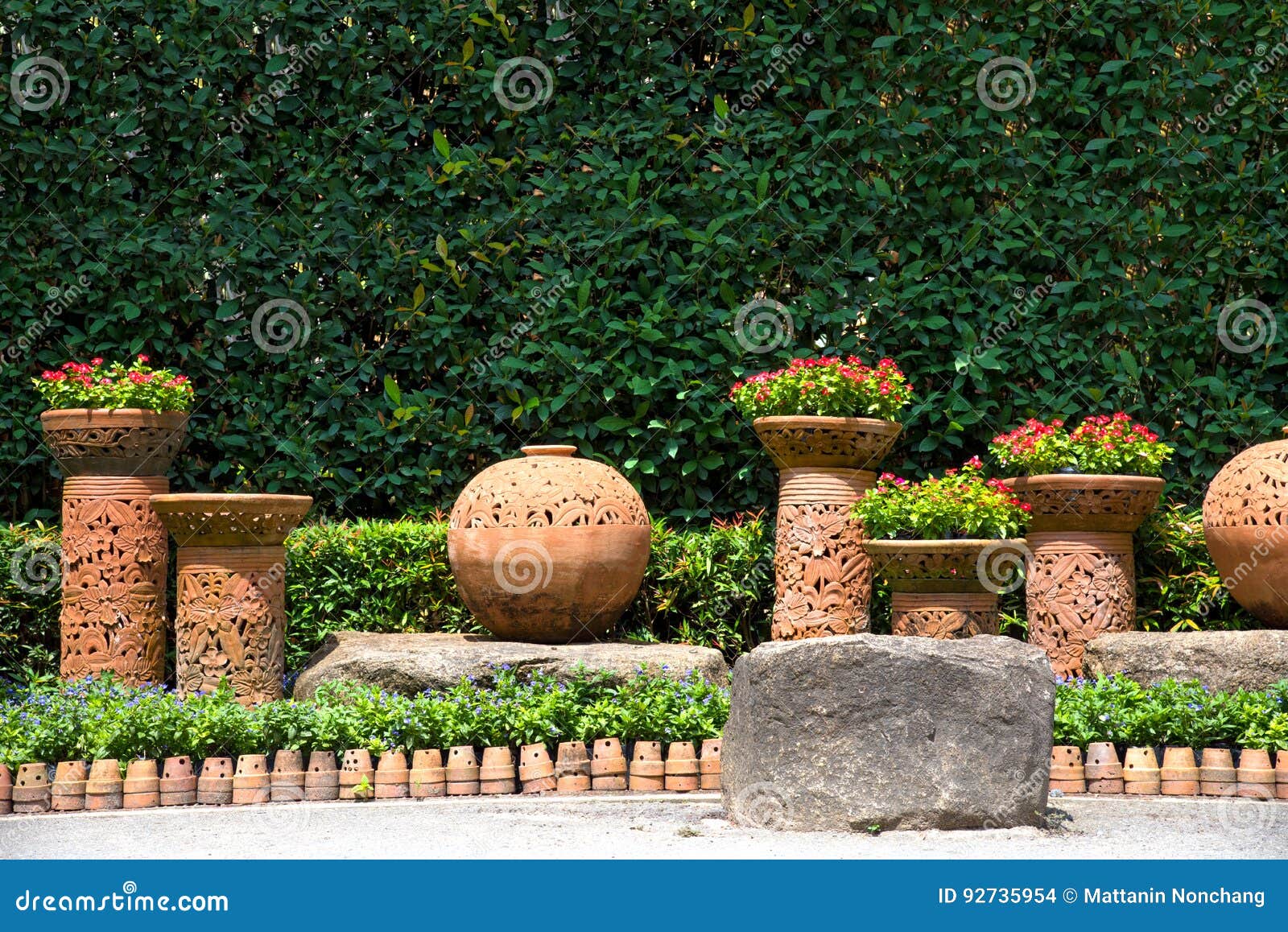 Little Tree Garden in Clay Pots on Green Tree Stock Photo - Image of ...