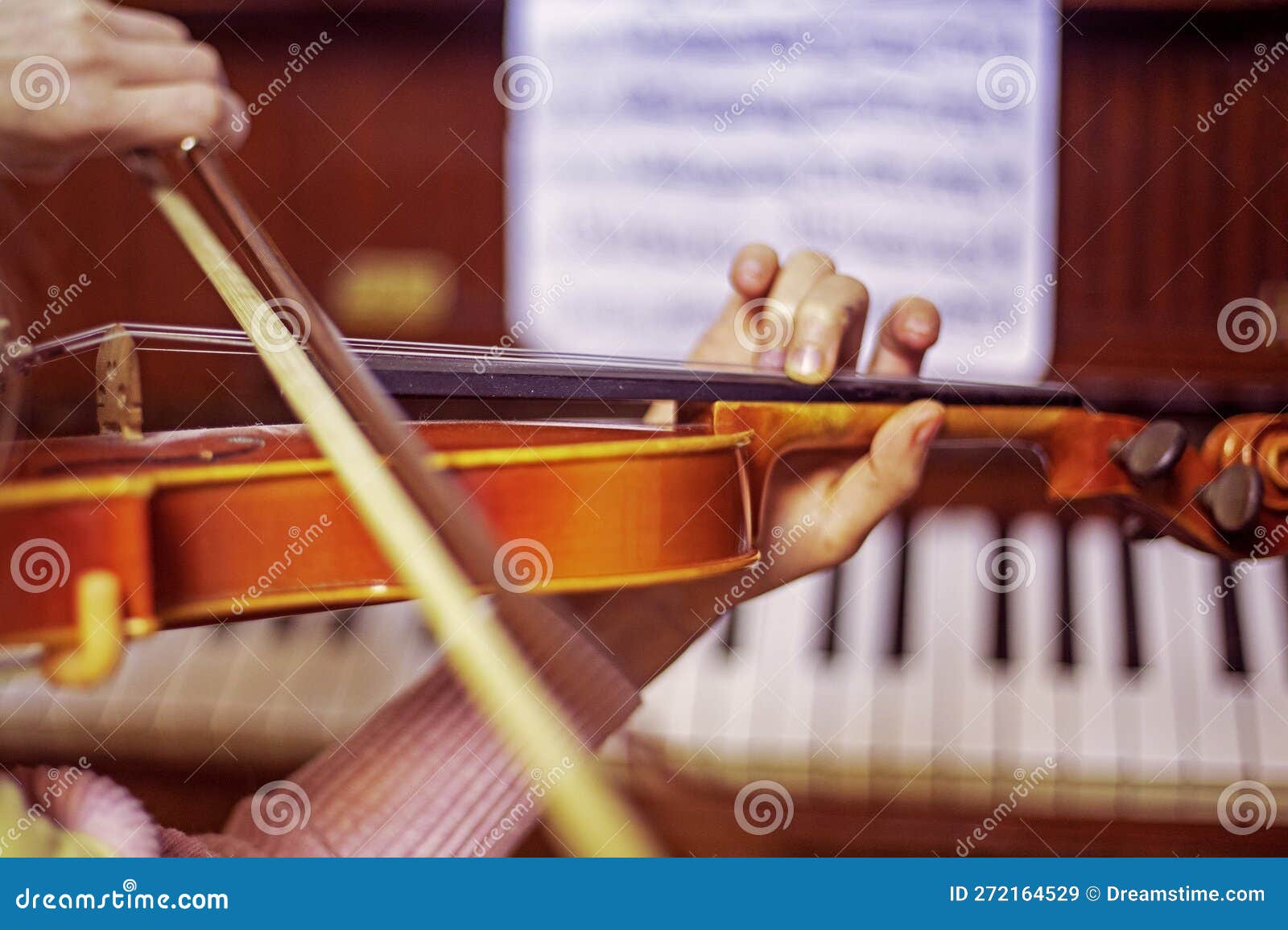Little Violinist is Learning a Piece, Setting Hands, Violin, Stock ...