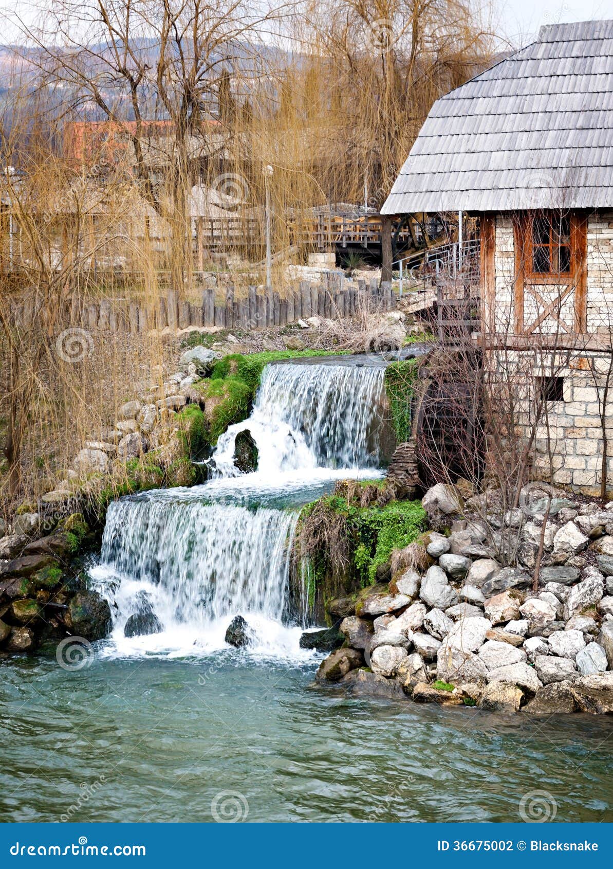 Little Waterfall and Old House Stock Photo - Image of stream, water ...