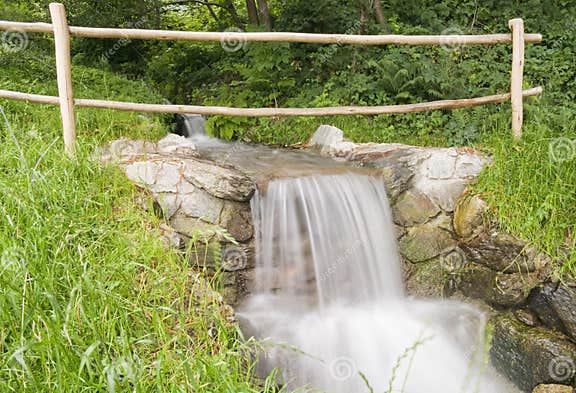 Little Waterfall with Railing Stock Image - Image of spring, rural: 6950405