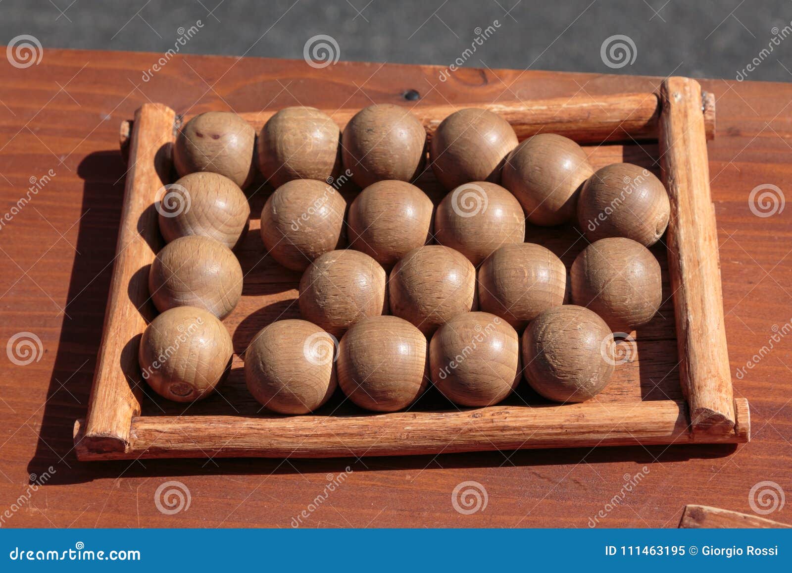 Little Wooden Balls on Table Inside Rectangular Field: Antique Game ...
