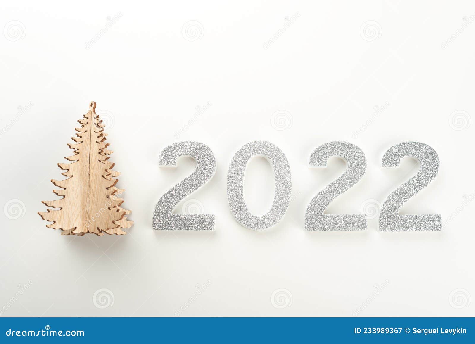 Little Wooden Christmas Tree with 2022 Numbers on Light Background ...