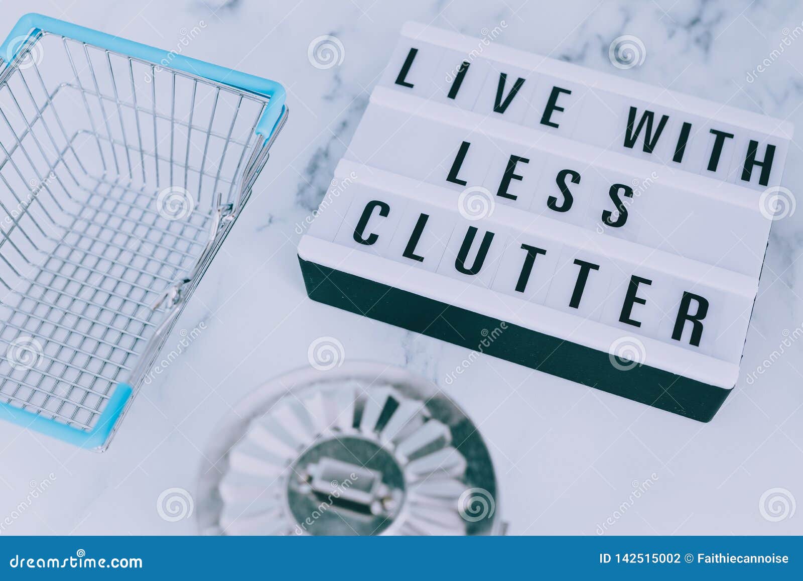 Live with less Clutter Message on Lightbox with Shopping Basket and ...