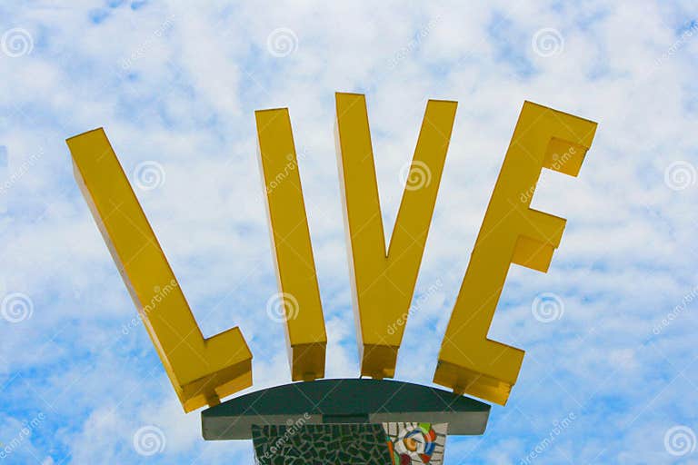 Live Sign with Sky stock photo. Image of yellow, pedastal - 886458