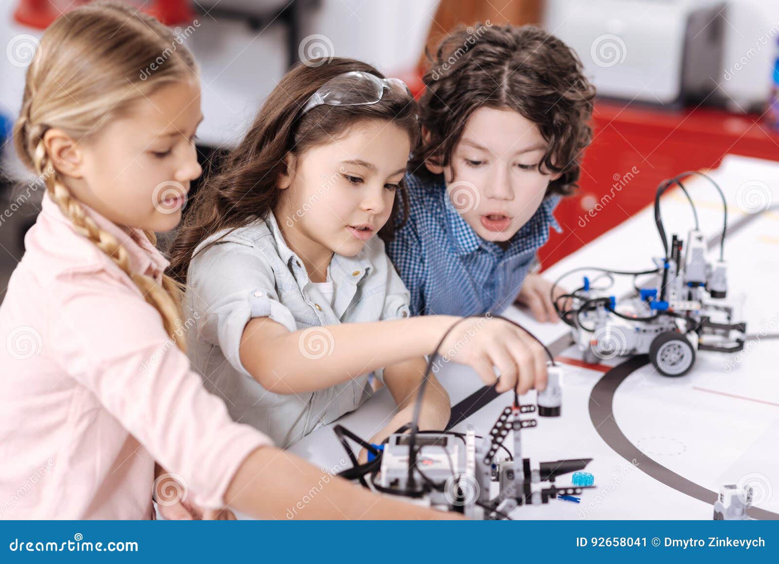 Lively Children Discussing Project at School Stock Image - Image of ...
