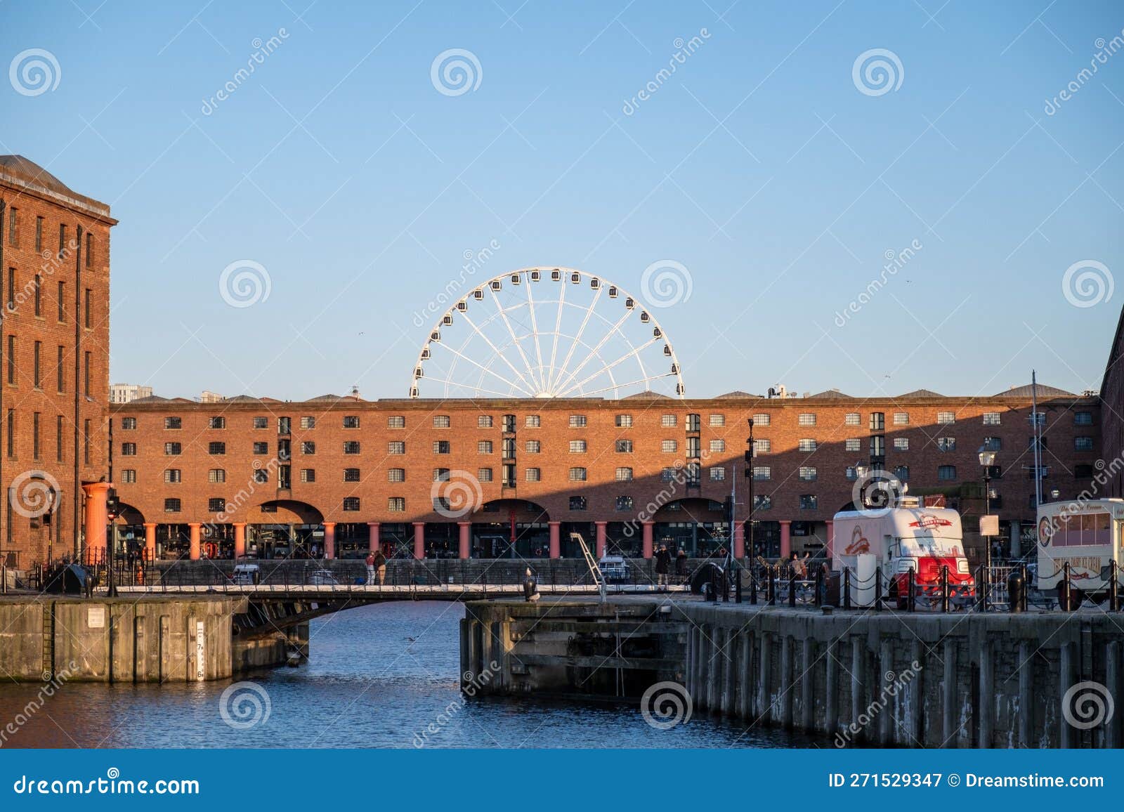 Liverpool Albert Dock with the Wheel of Liverpool in the Background ...
