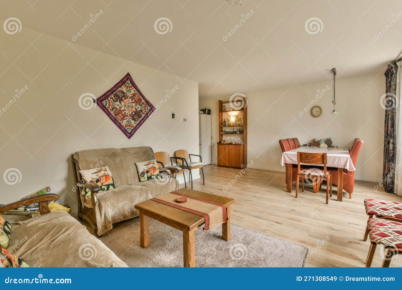 A Living Room with a Couch and a Dining Table Stock Image - Image of ...