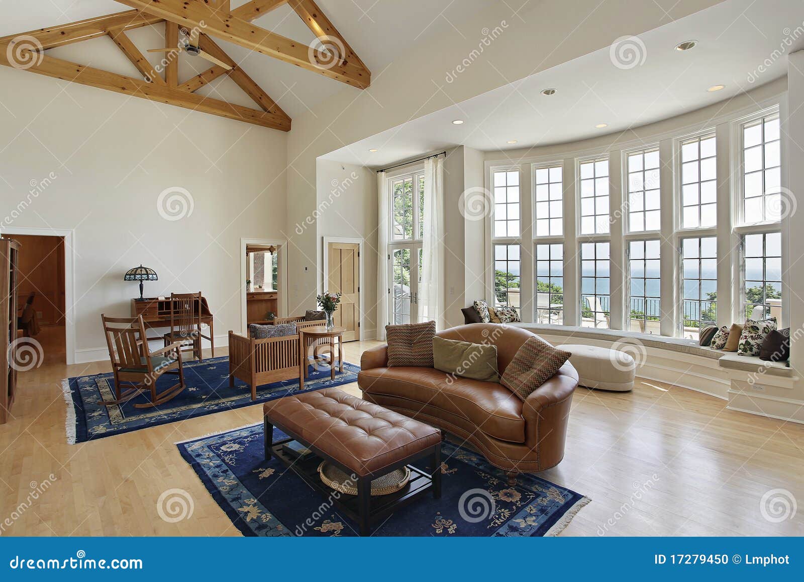 Living Room with Curved Windows Stock Photo - Image of dwelling ...