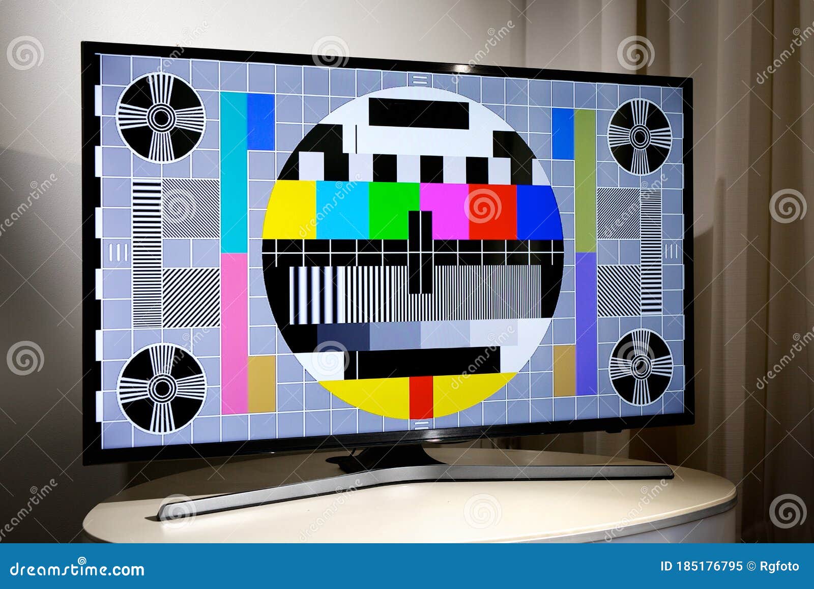 Living Room with LCD Television Displaying Multi Colored Test Screen ...