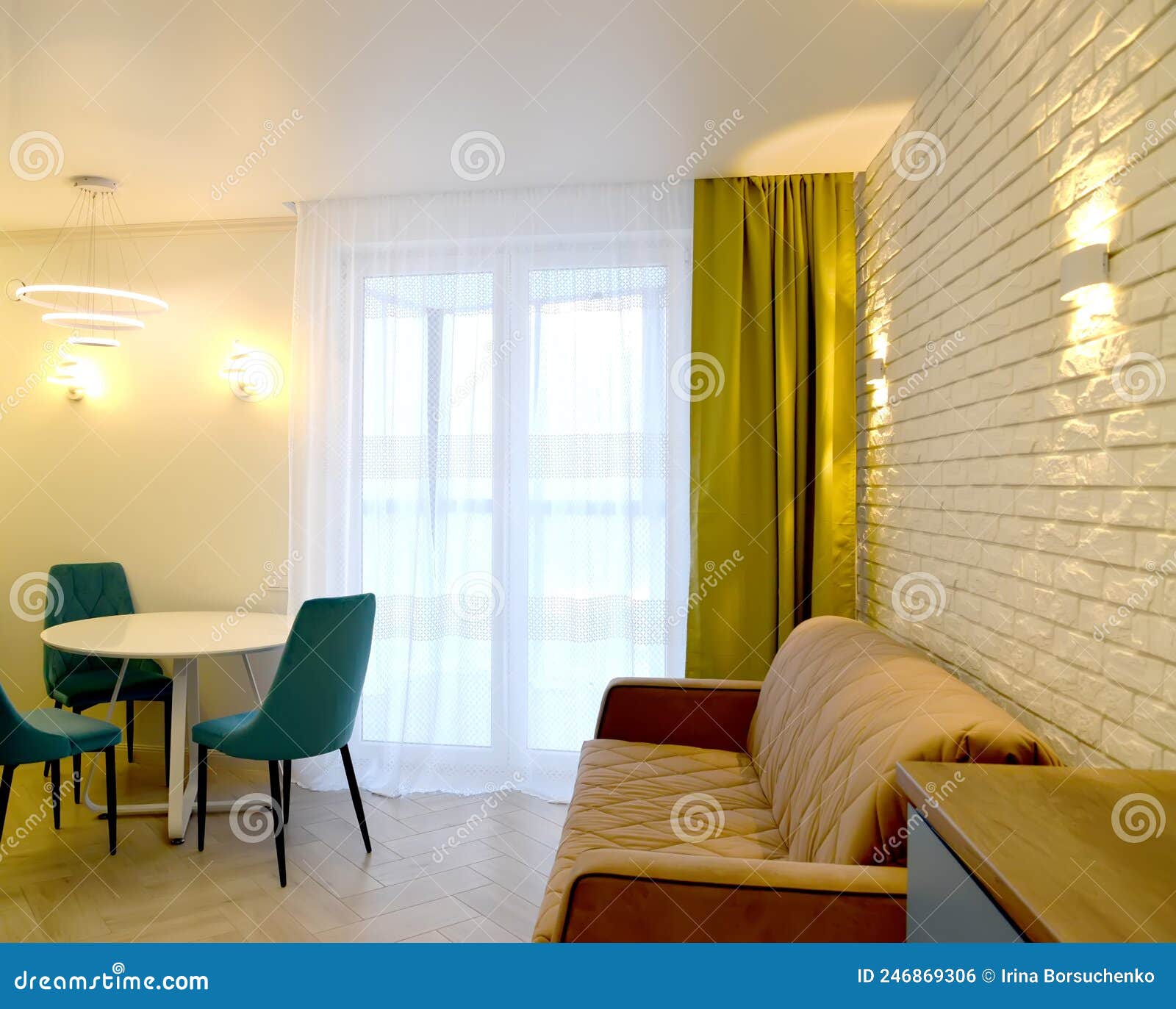 Living Room with Sofa and Round Table Stock Photo - Image of lamp ...